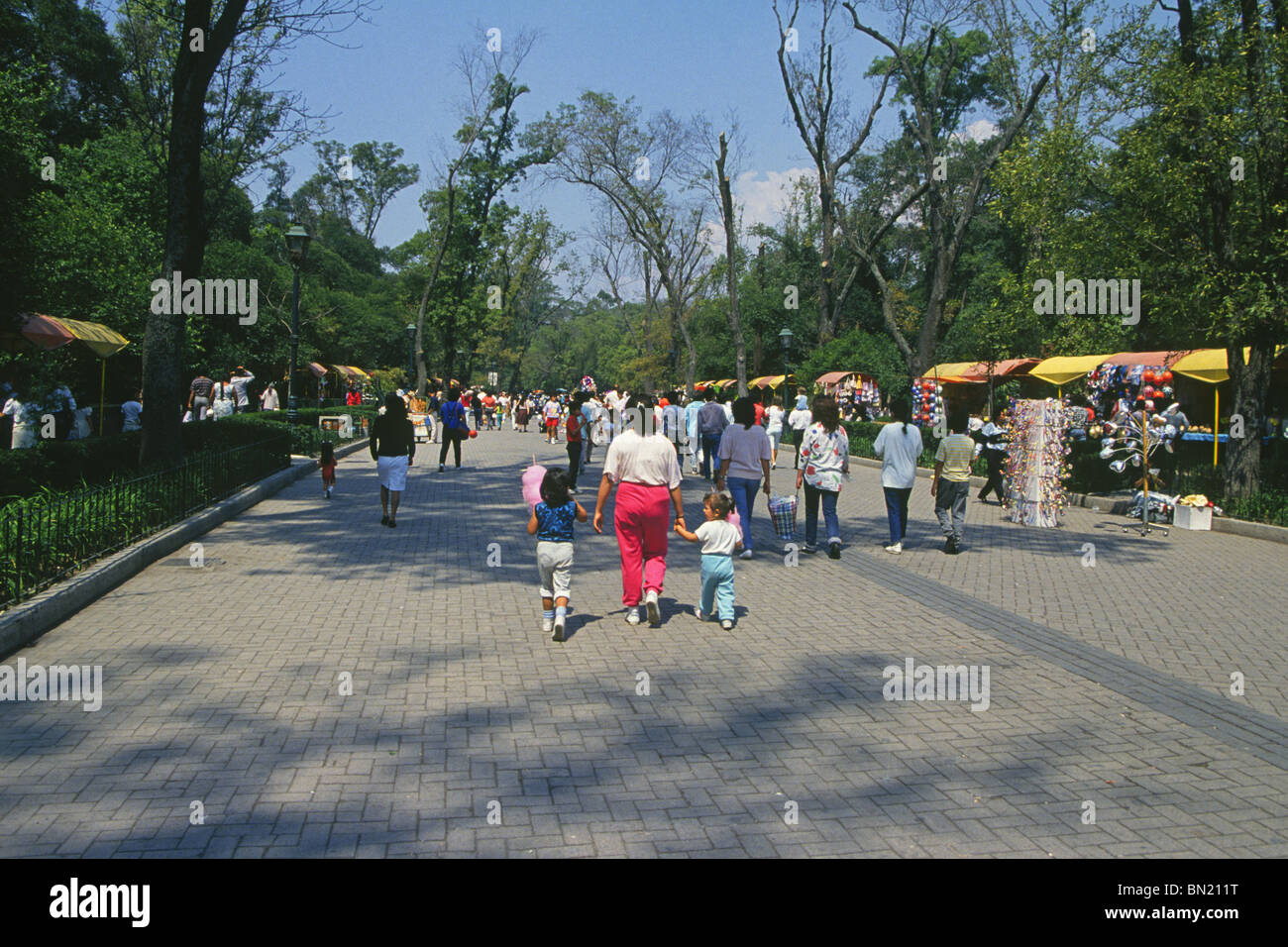 Sunday strollers and walkers in Chapultepec Park, in downtown Mexico ...