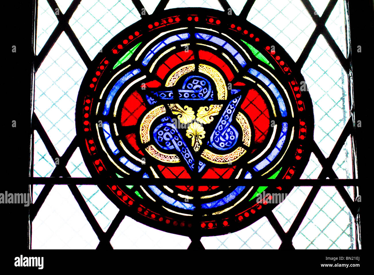 Stained glass window round trinity hi-res stock photography and images ...
