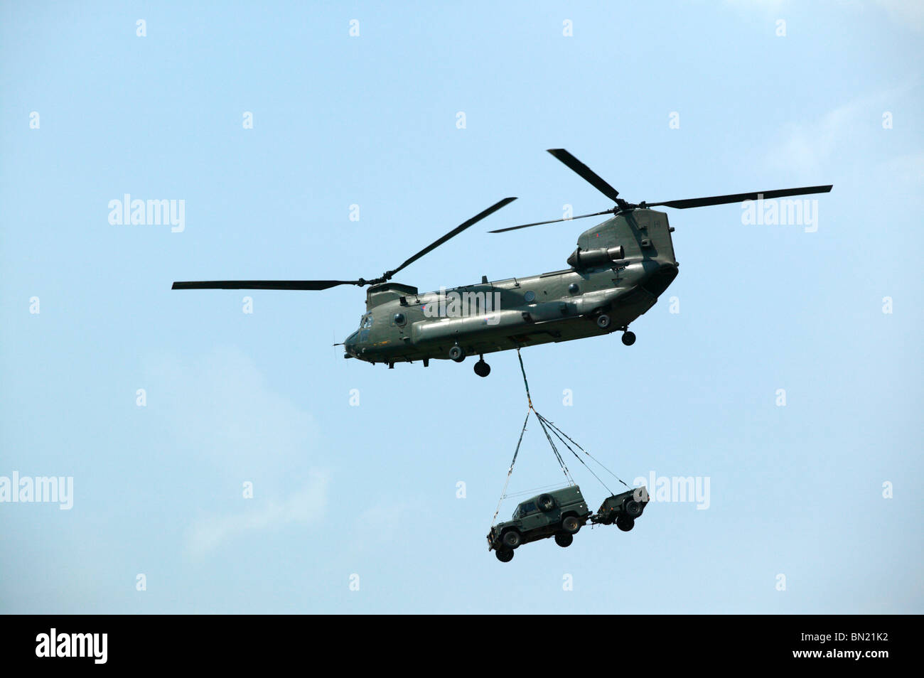 RAF Chinook HC.2 carrying an underslung Landrover and Trailer combo ...