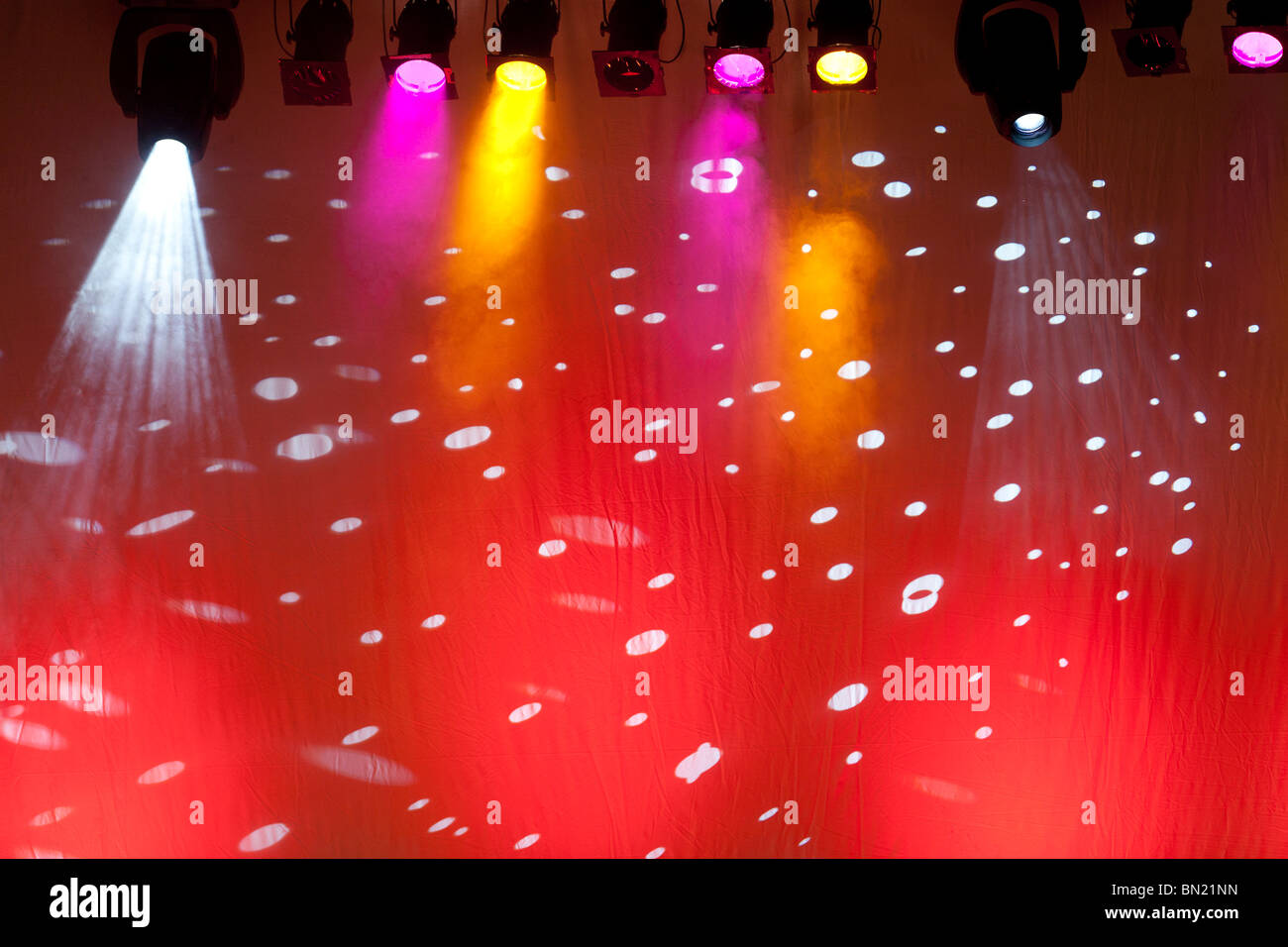 colorful spotlights projection on stage background Stock Photo - Alamy