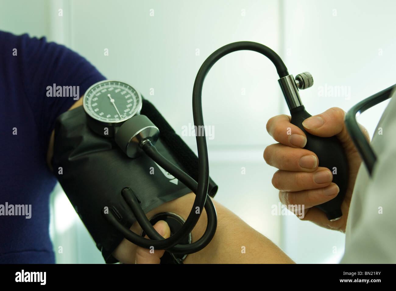 Checking blood pressure Stock Photo - Alamy