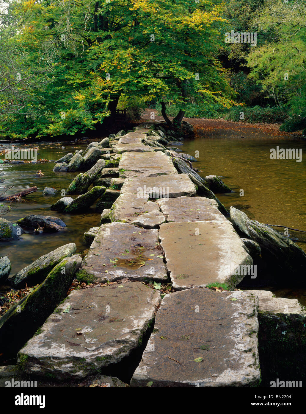 Tarr Steps, the clapper bridge over the river Barle in Exmoor National ...