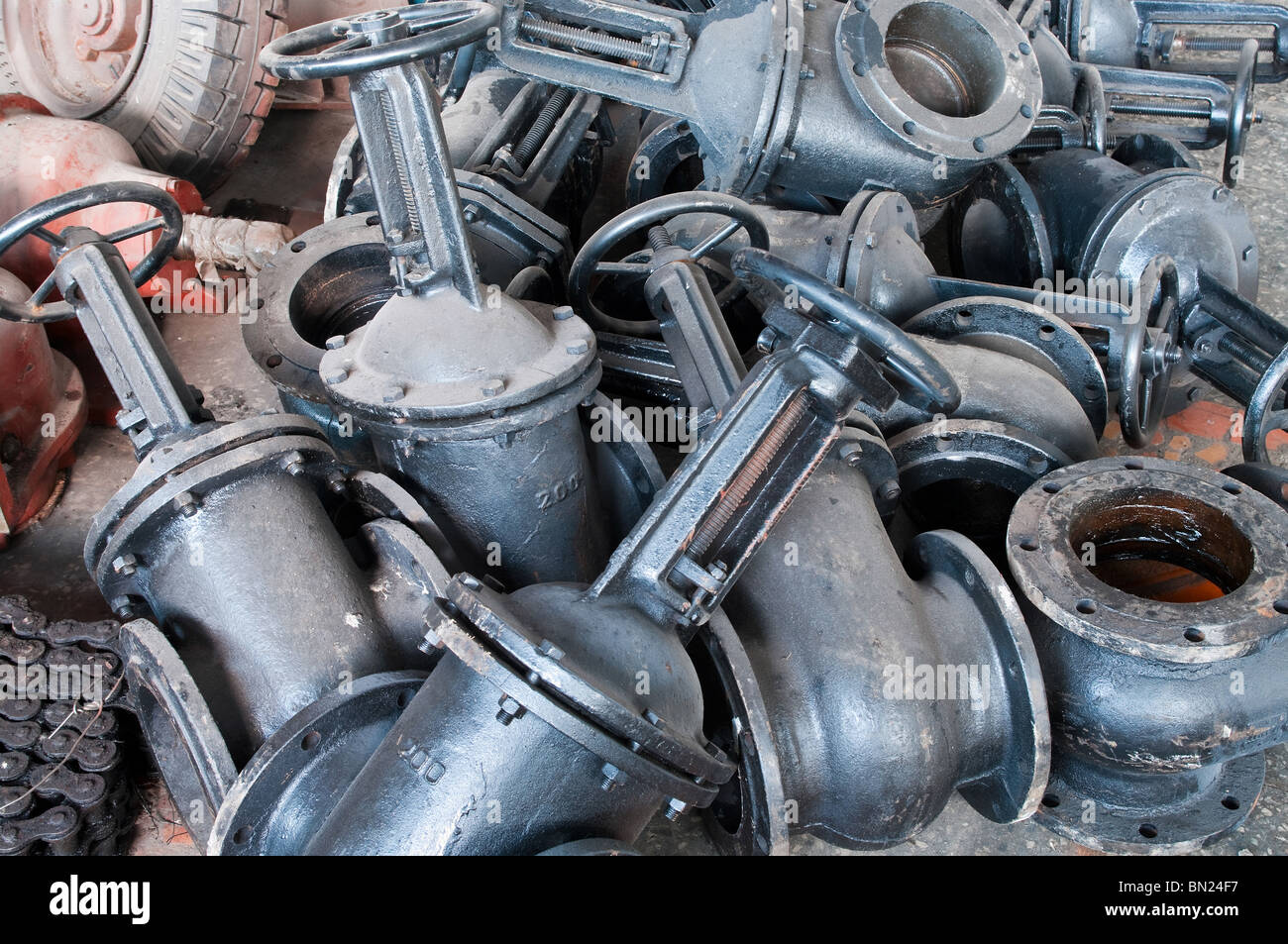 Heap of water shut-off valves big diameter. Background Stock Photo - Alamy