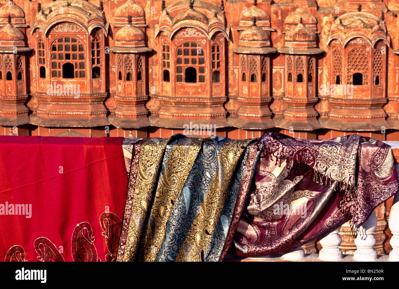 Colored fabric drapes over a balcony overlooking the Palace of the ...