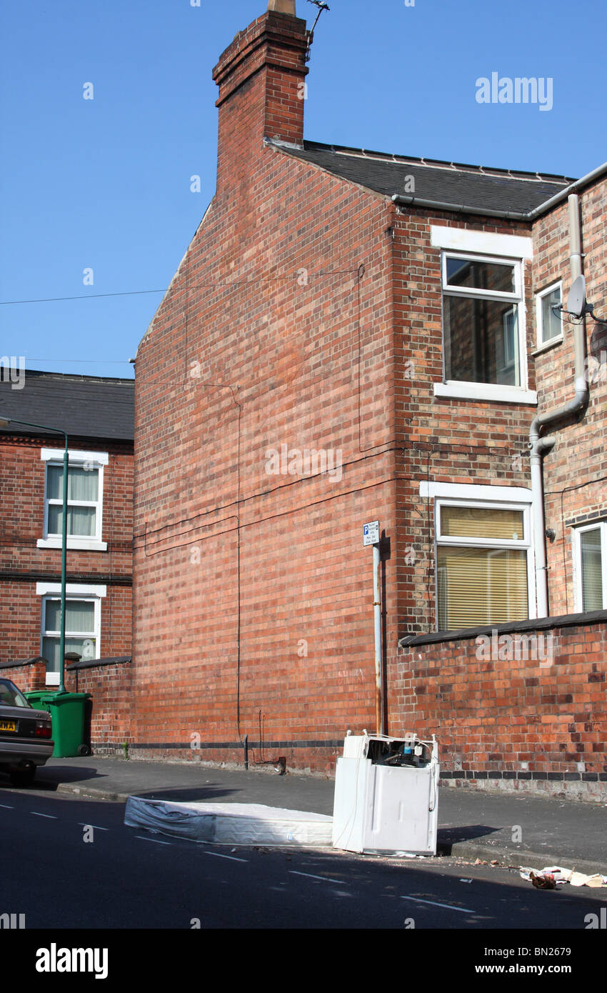 Fly tipping on a street in a U.K. city Stock Photo - Alamy