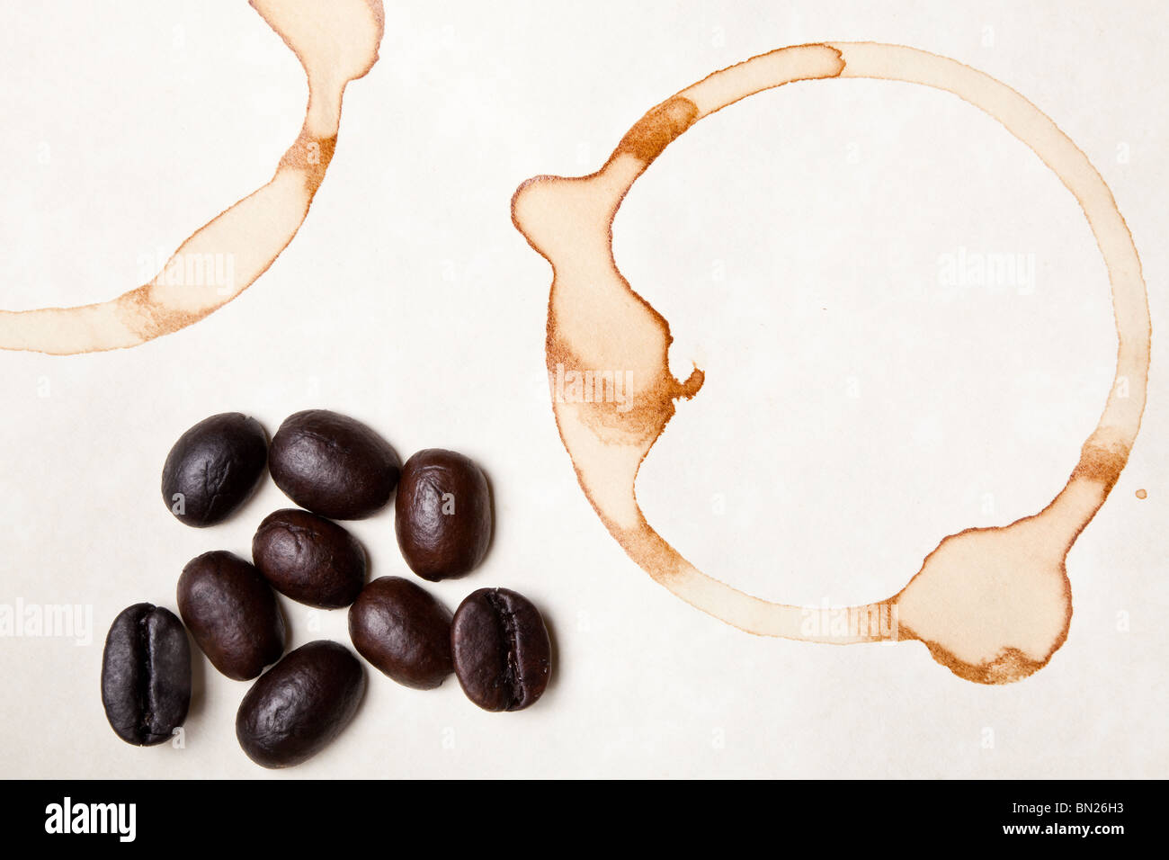coffee beans on a parchment paper background Stock Photo - Alamy