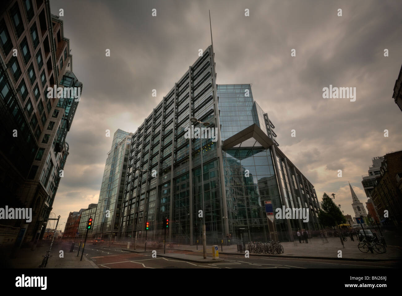 london city street at at day time cars and people going by Stock Photo ...