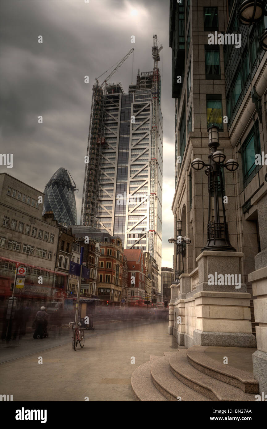 london city street at at day time cars and people going by Stock Photo ...