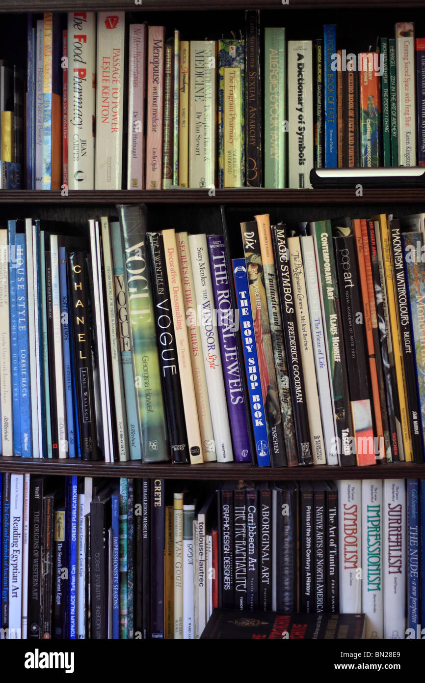 Book case full of art and health related books Stock Photo - Alamy