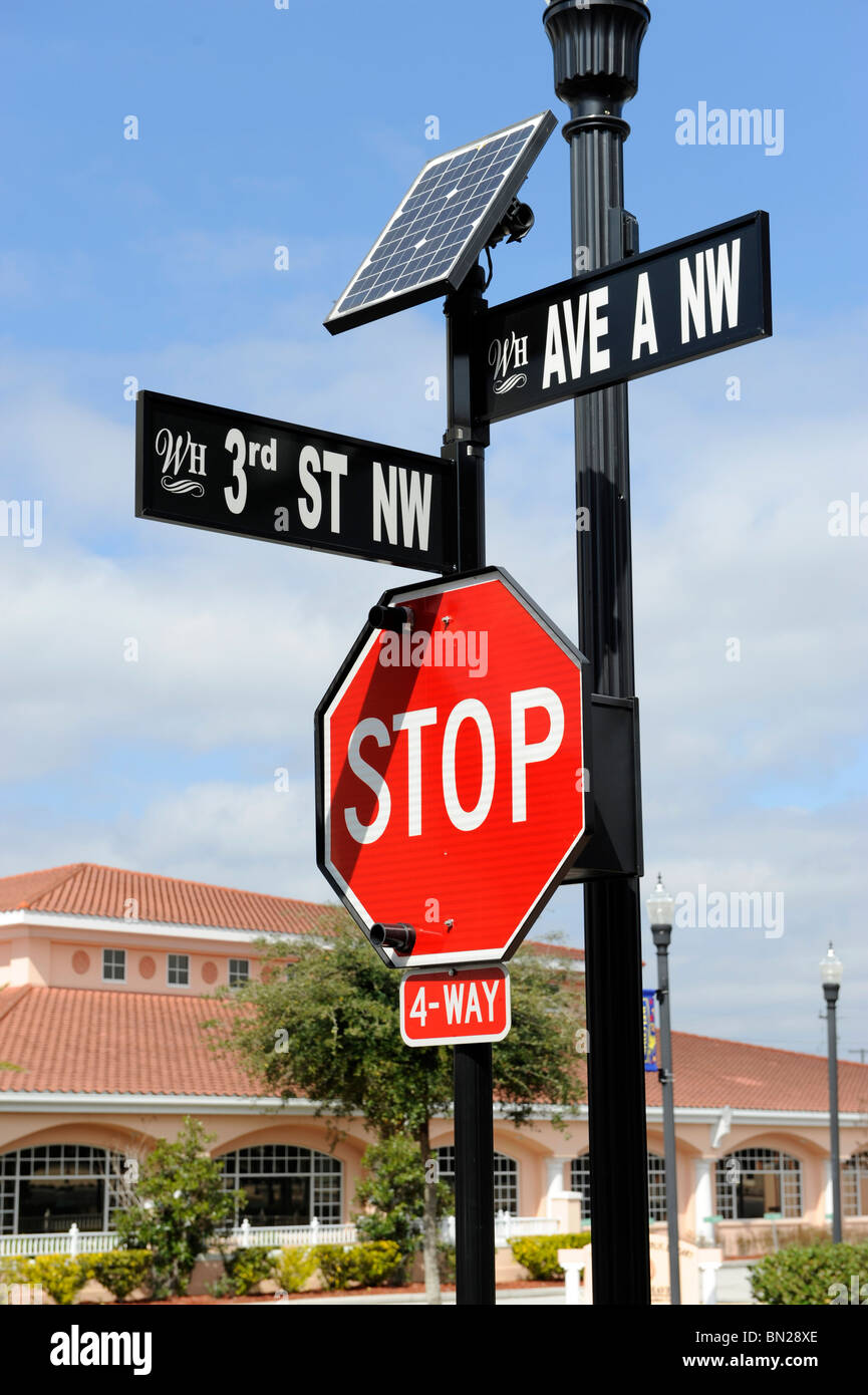 Lighted stop sign powered by solar panel energy Stock Photo - Alamy