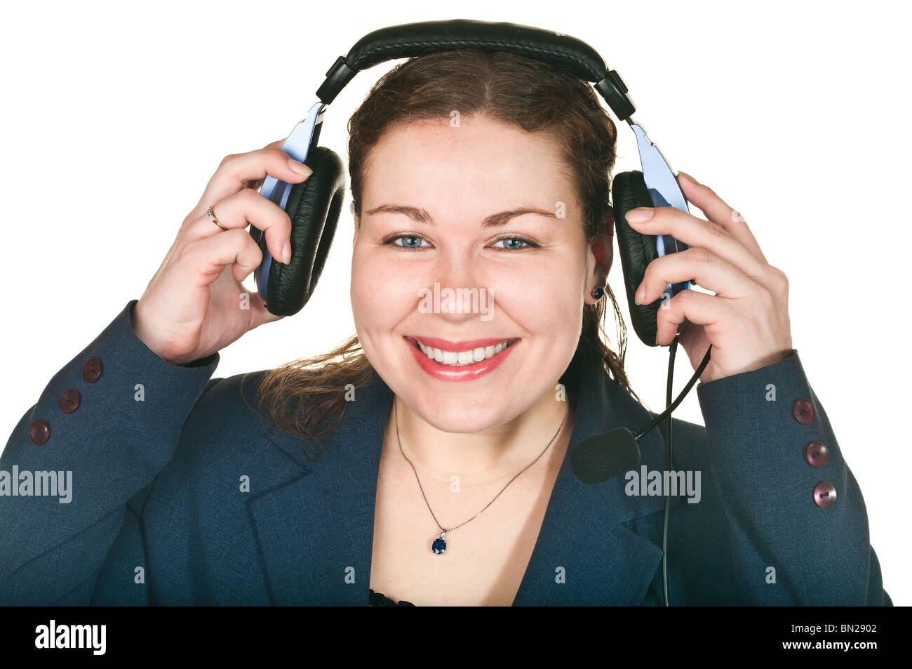 Laughing happy operator young woman in a call center. Isolated on white ...