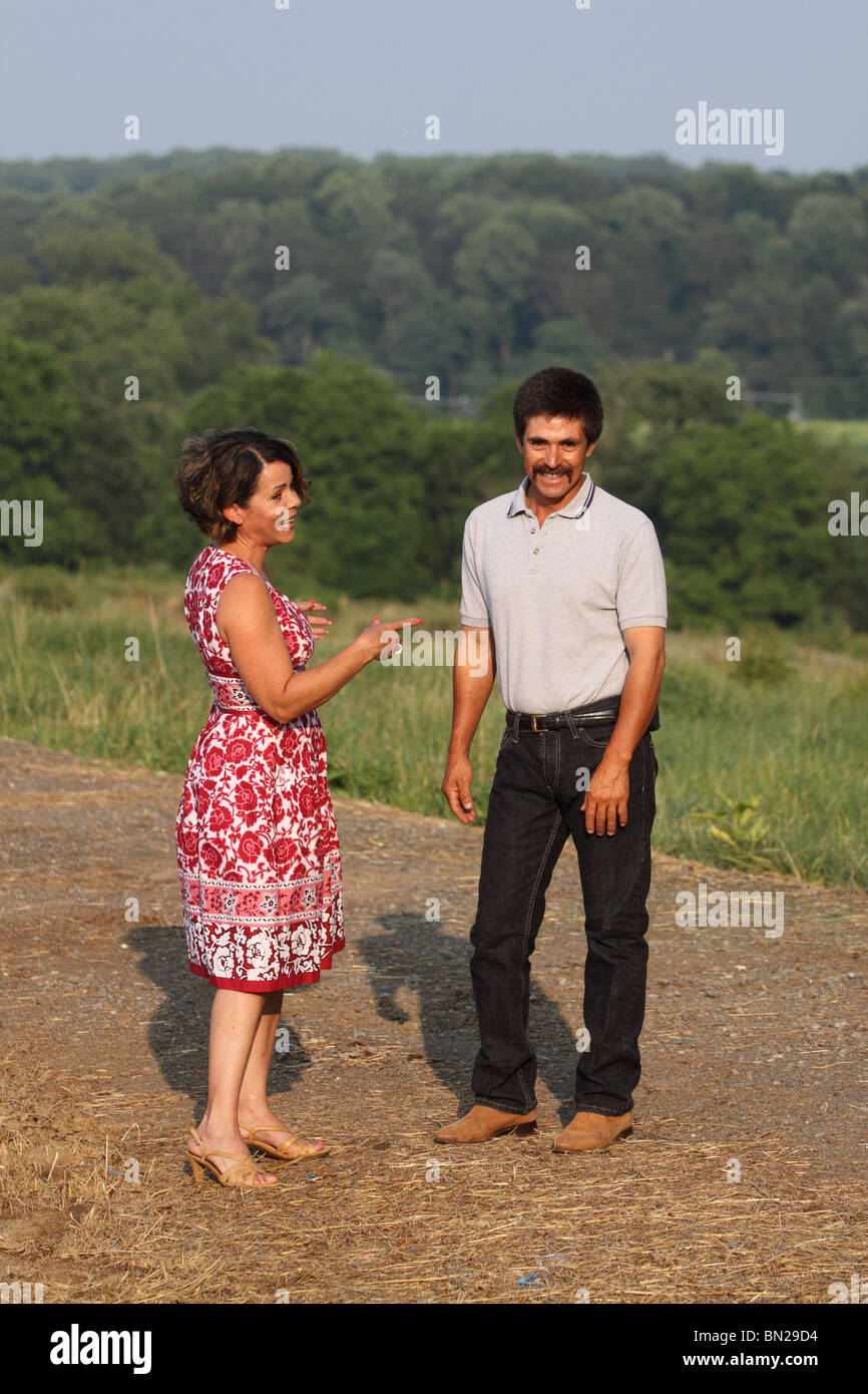 Happy mexican couple talking hi-res stock photography and images - Alamy