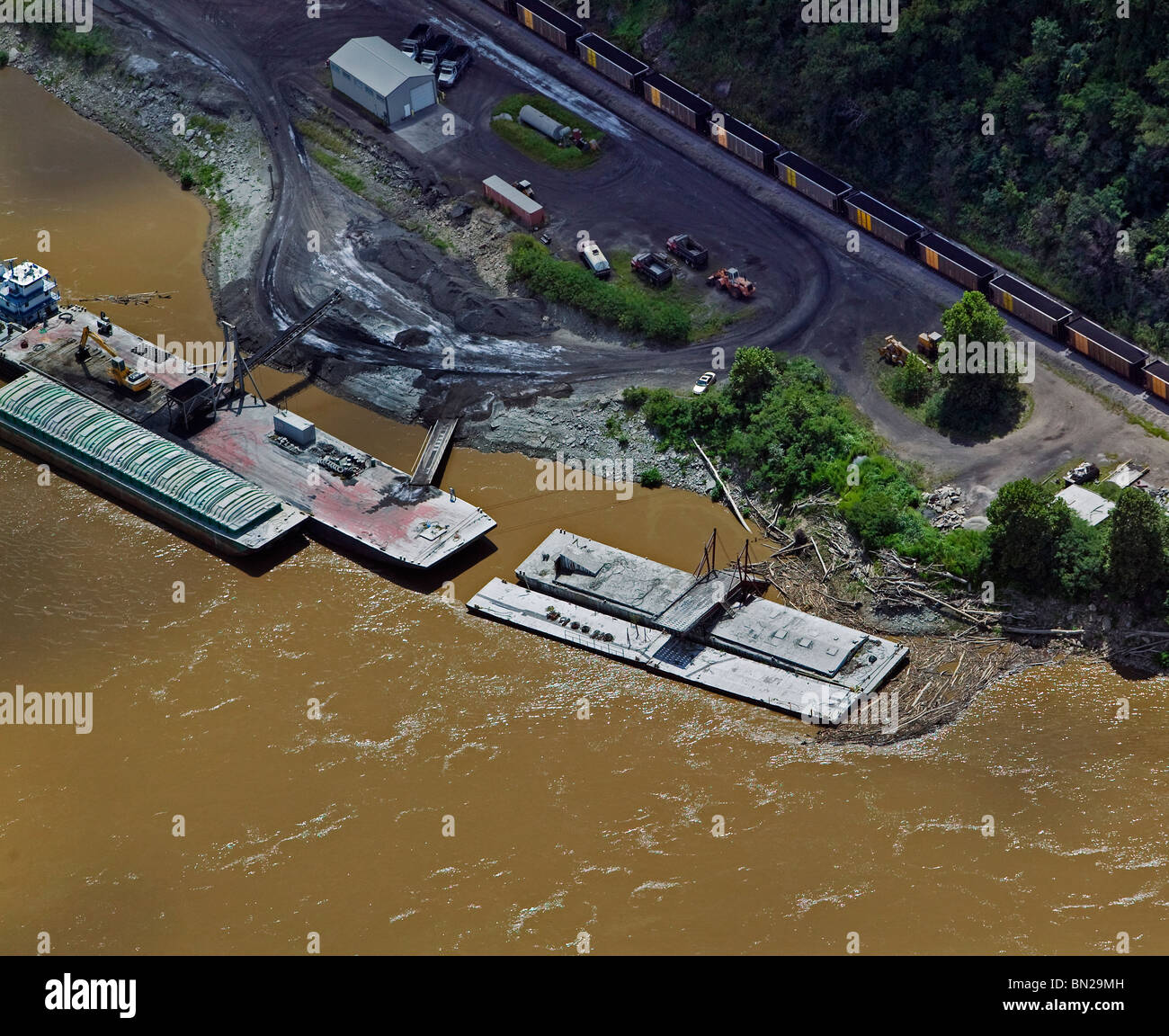 aerial view above barges coal rail cars Mississippi river Missouri ...