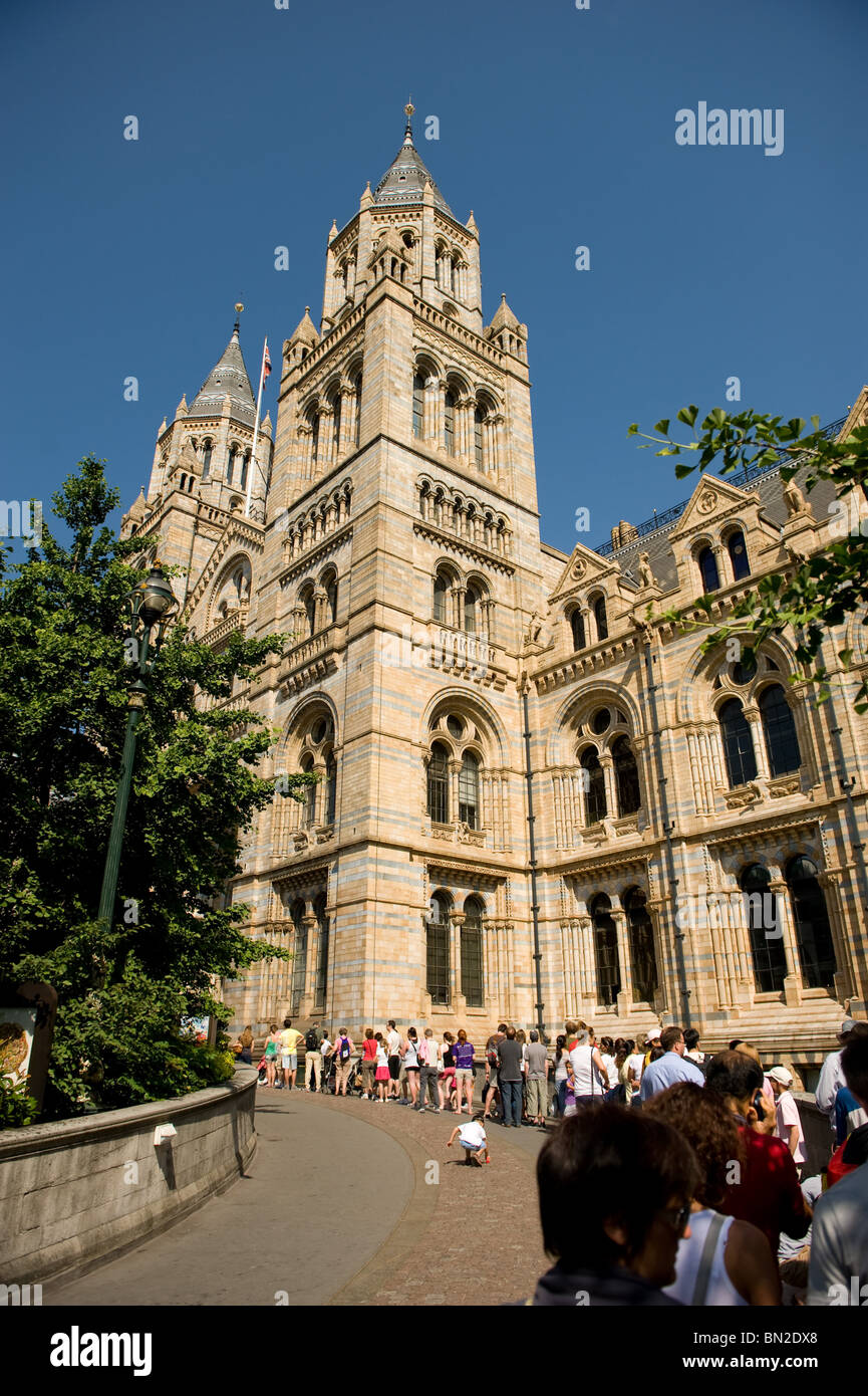 Visitors queuing outside the entrance to the Natural History Museum on ...
