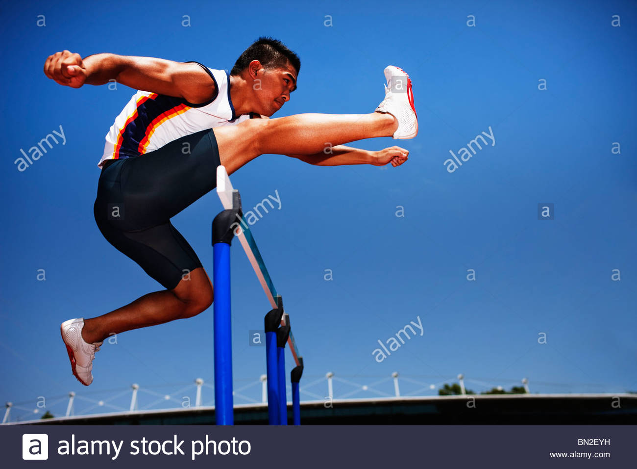 Man Jumping Hurdle Stock Photos & Man Jumping Hurdle Stock Images - Alamy