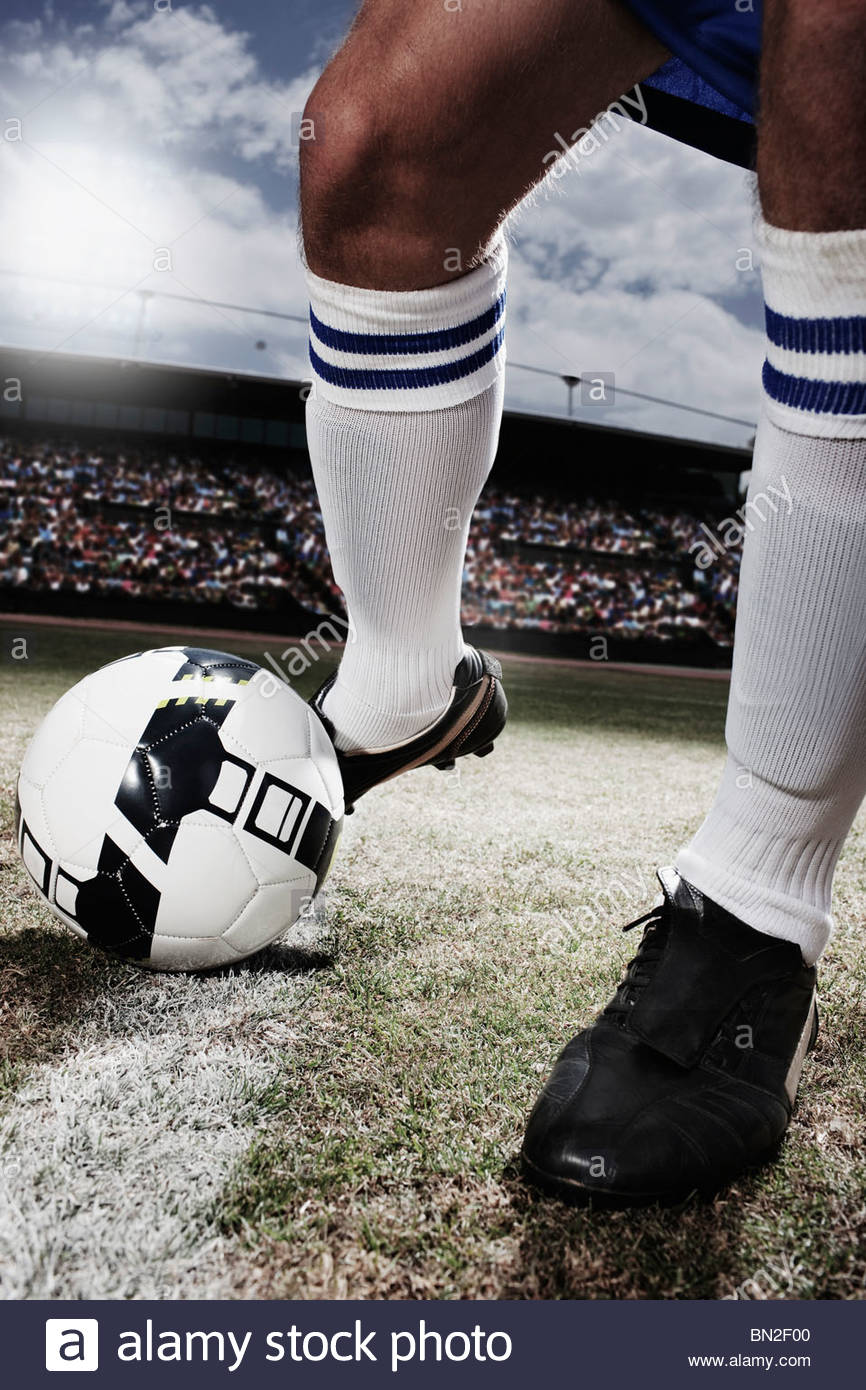 Footballer Kicking Ball Stock Photos & Footballer Kicking Ball Stock ...