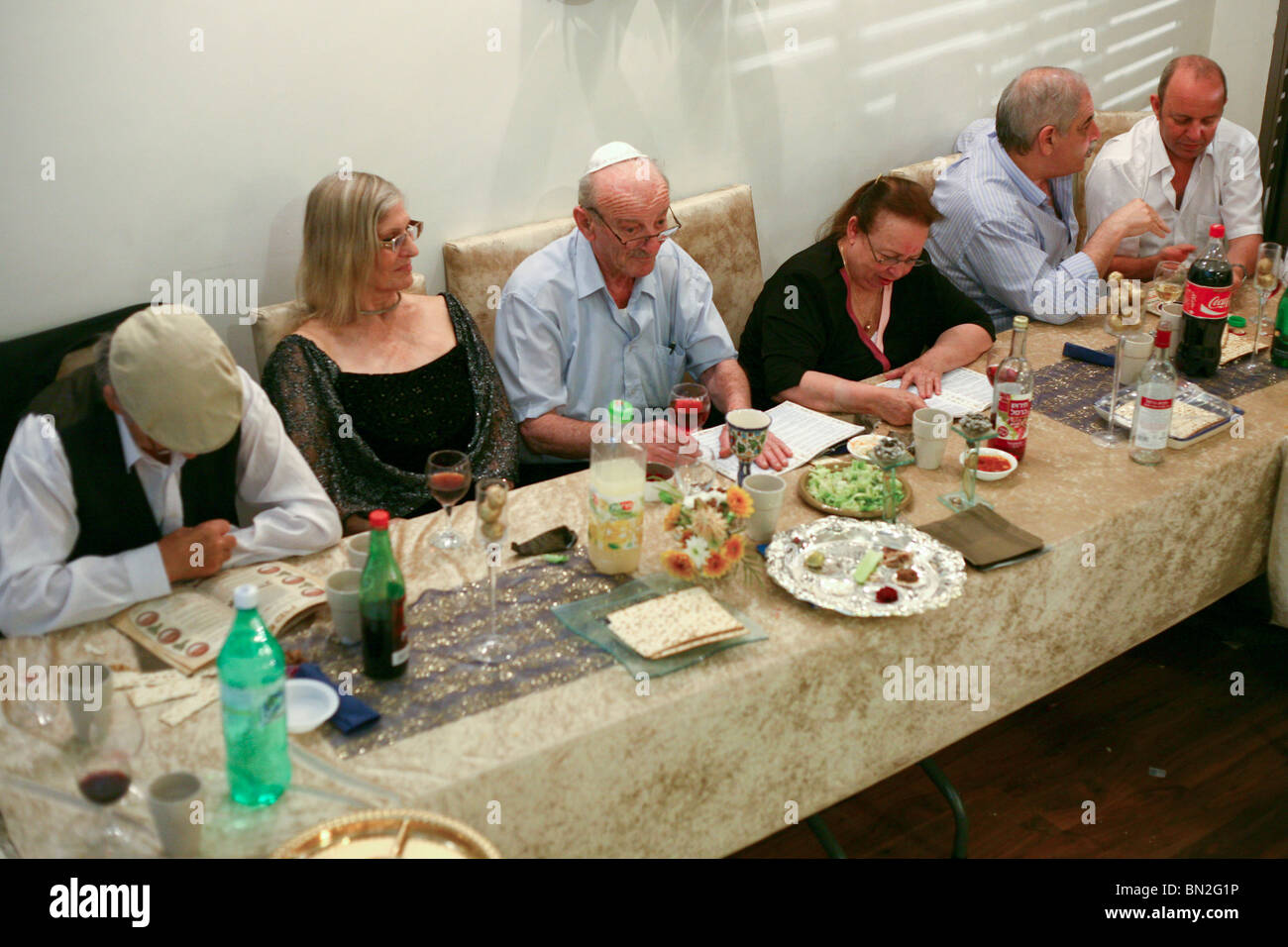 An israeli family attending a "Seder", the traditional passover dinner ...