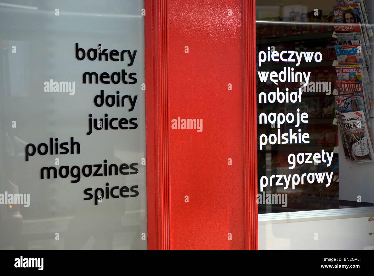 Windows of a Polish corner shop in Edinburgh, Scotland, advertising its ...