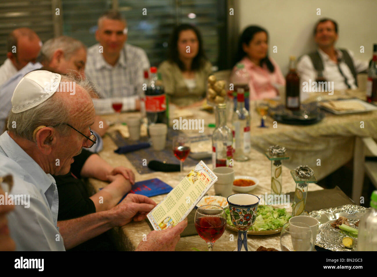 An israeli family attending a "Seder", the traditional passover dinner ...