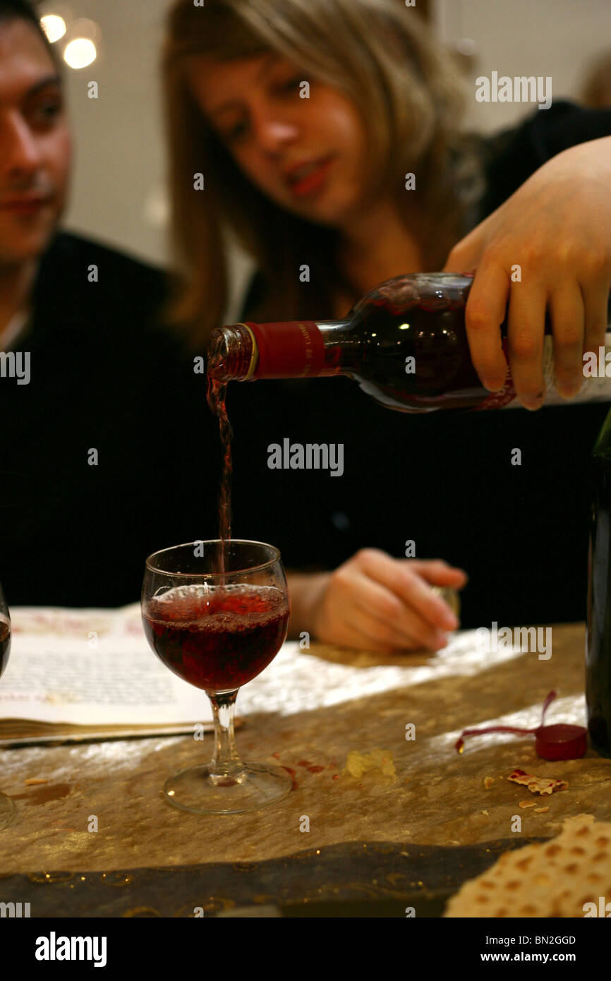 An israeli family attending a "Seder", the traditional passover dinner ...