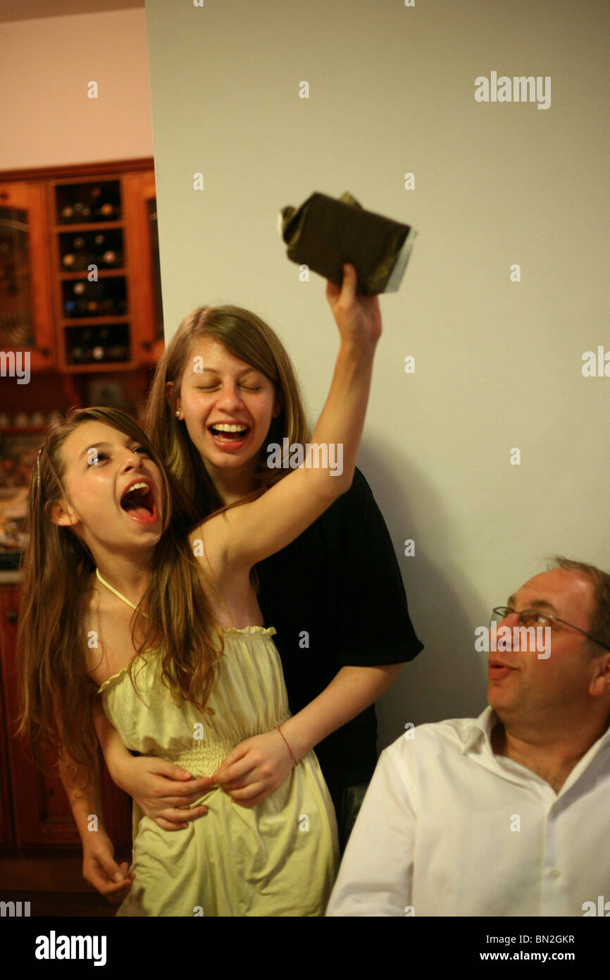 Israeli family attending a seder hi-res stock photography and images ...