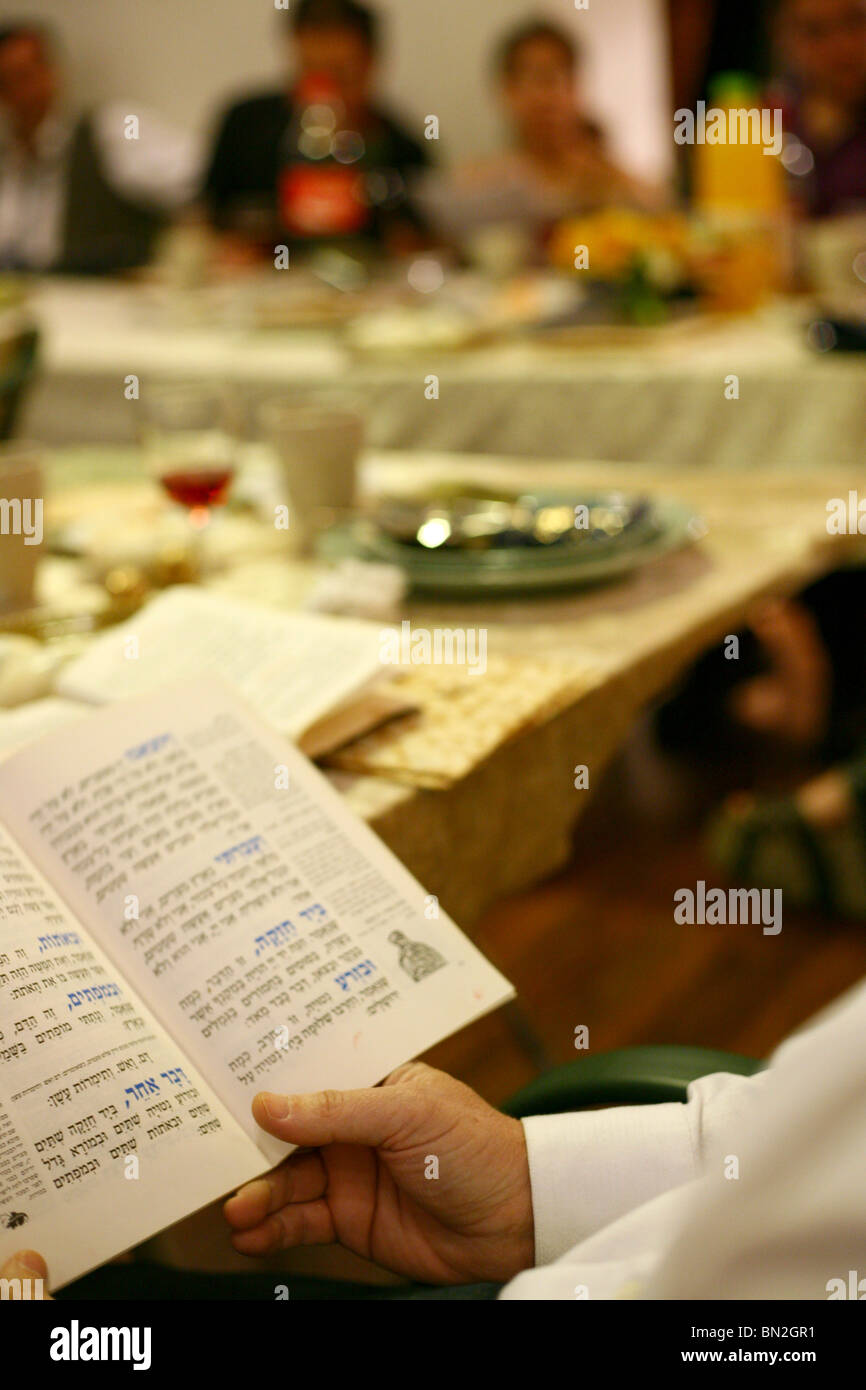 An israeli family attending a "Seder", the traditional passover dinner ...