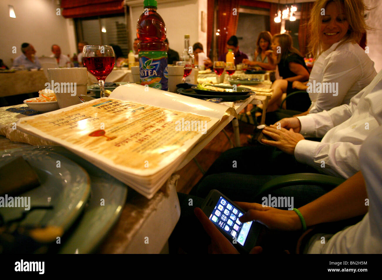 An israeli family attending a "Seder", the traditional passover dinner ...