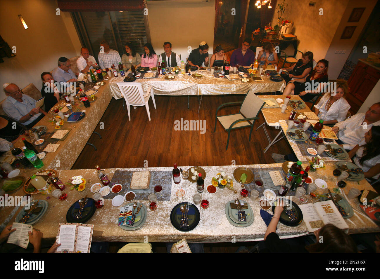 An israeli family attending a "Seder", the traditional passover dinner ...