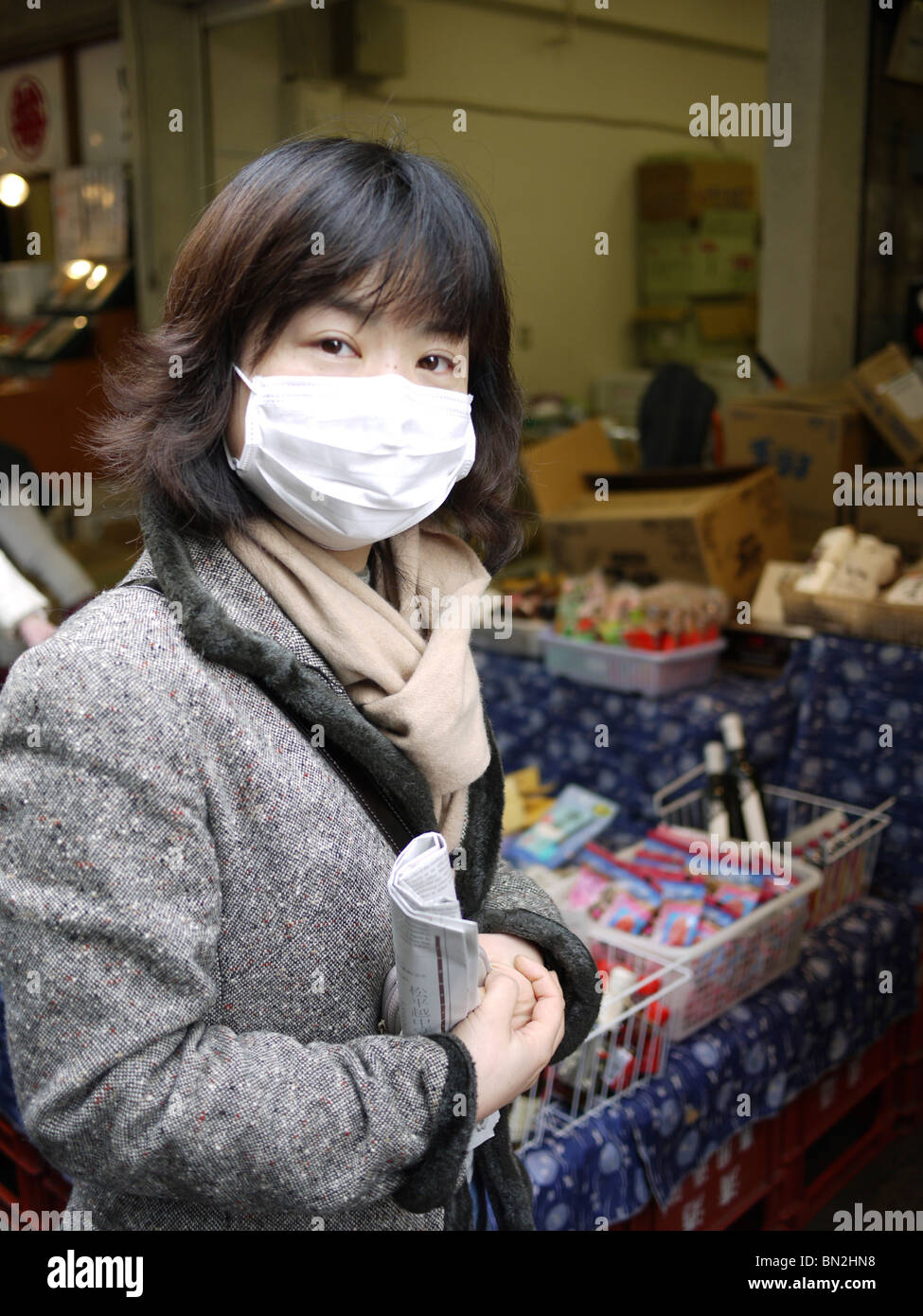 Japan, Tokyo woman with facial surgical mask Stock Photo - Alamy