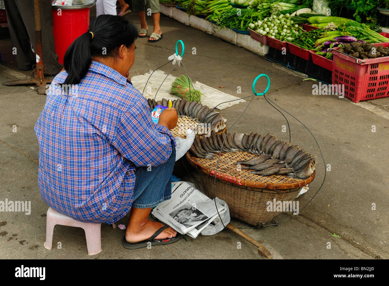 Woman selling fish on a market in Takua Pa town, West of Thailand Stock ...