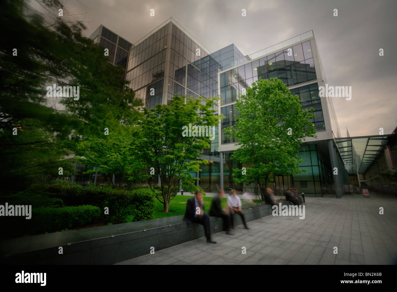 london city street at at day time cars and people going by Stock Photo ...