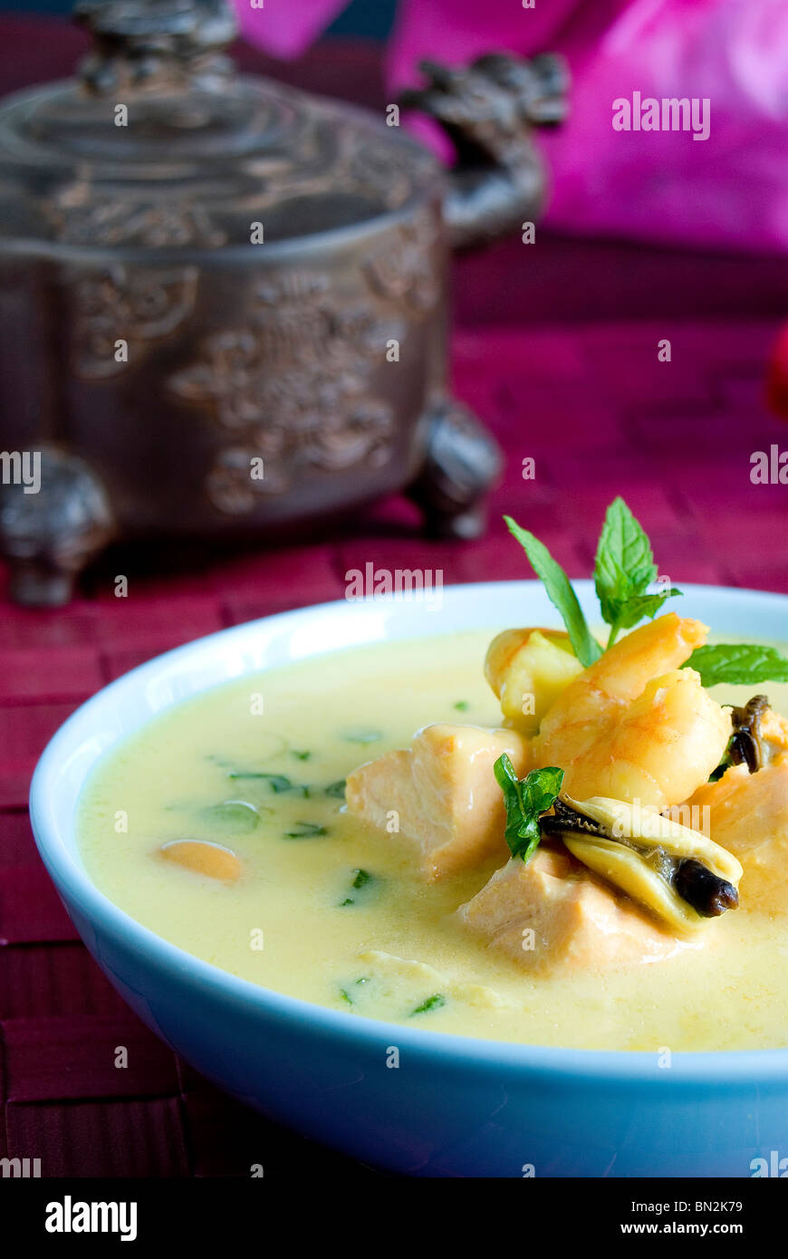 Curried seafood soup Stock Photo - Alamy