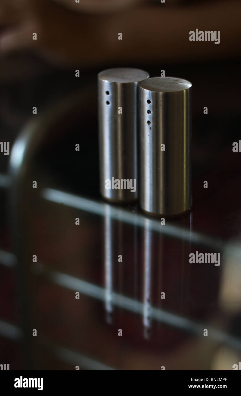 Salt pepper dropper in restaurant Stock Photo - Alamy