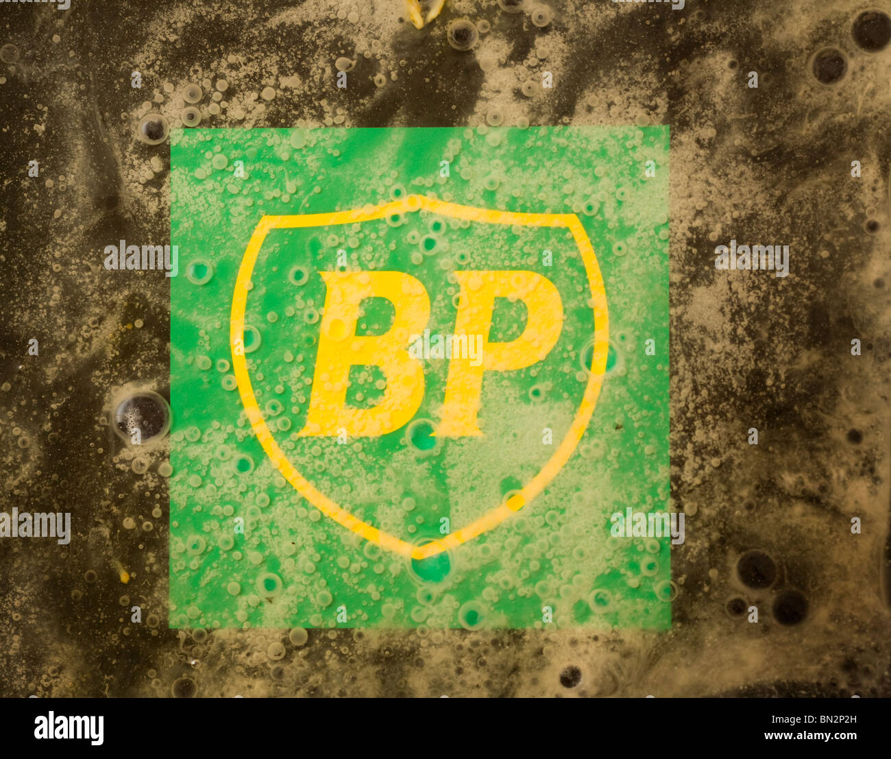 A BP logo covered in Oil and Water. Picture by James Boardman Stock ...