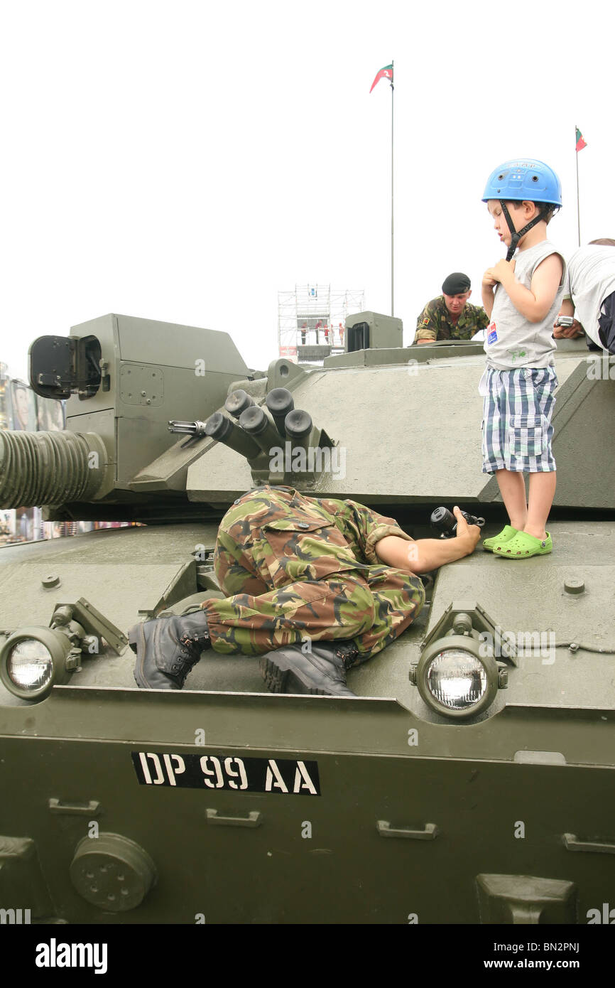 Visitors to the 2010 Biggin Hill Air Fair pour over a British Army ...