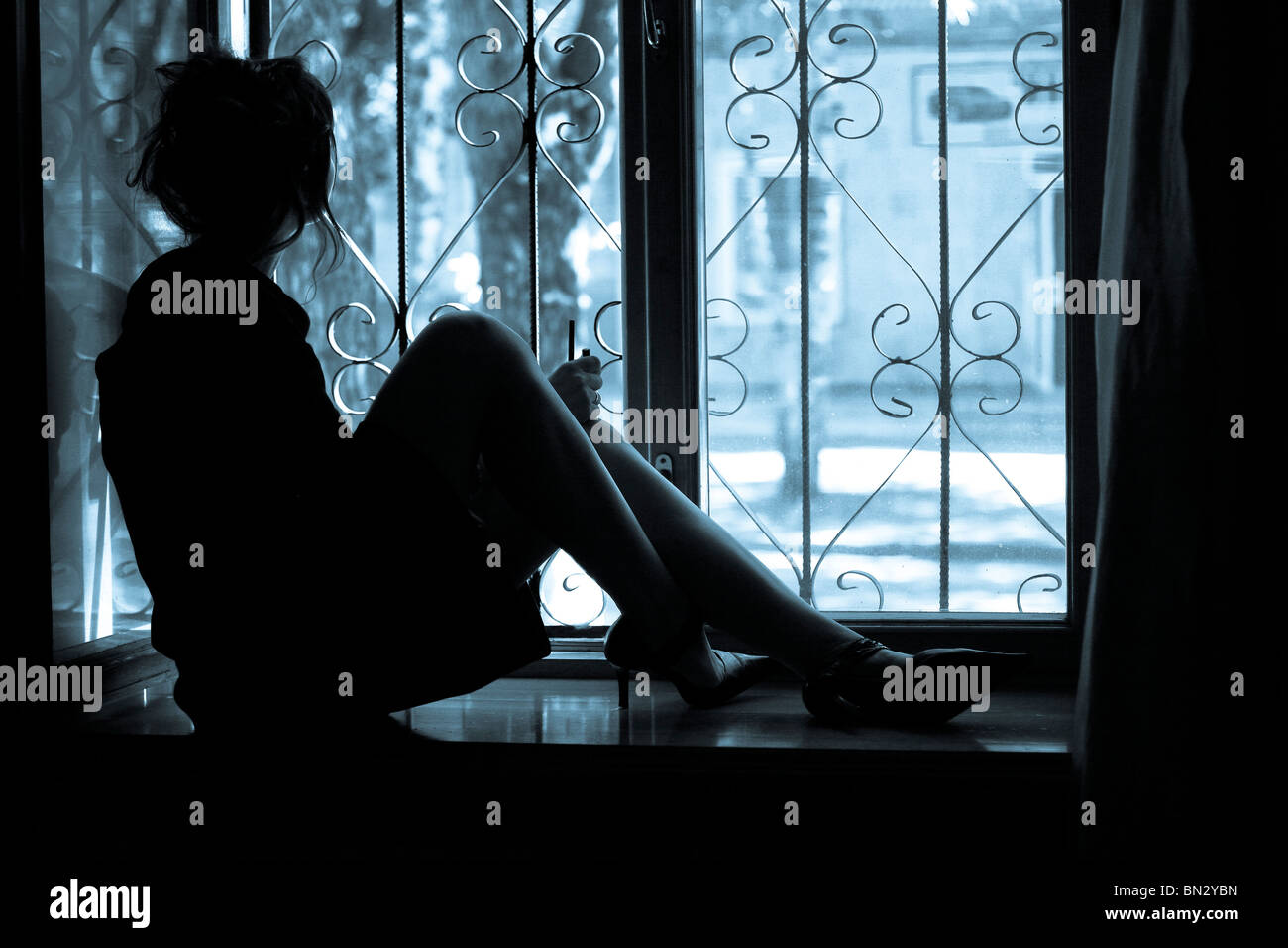 Abstract picture about woman's loneliness Stock Photo - Alamy