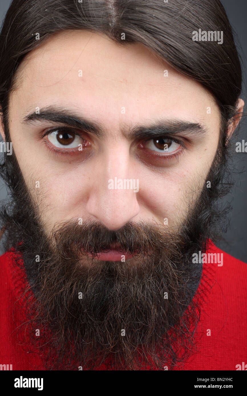angry man with mustache and black beard Stock Photo - Alamy