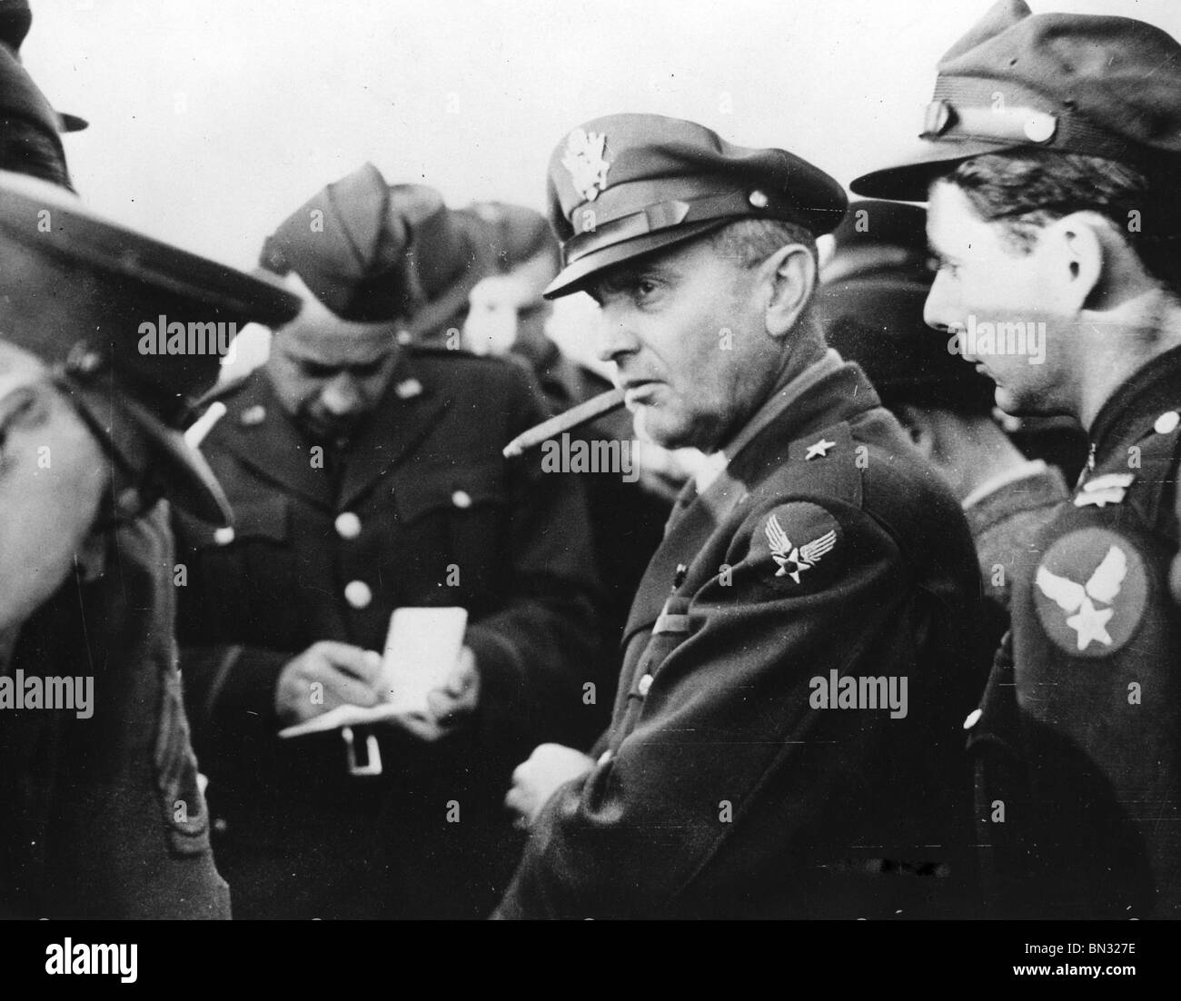 GENERAL IRA C EAKER gives a report after a bombing raid on Germany in ...