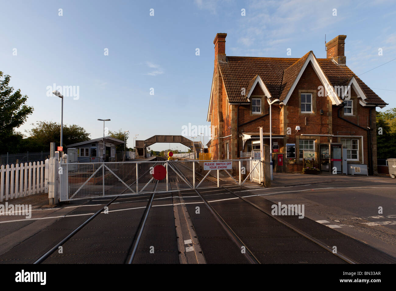 Station with level crossing hi-res stock photography and images - Alamy