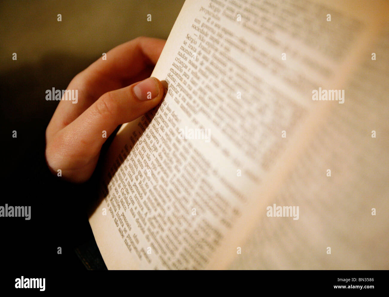 Reading a book Stock Photo - Alamy