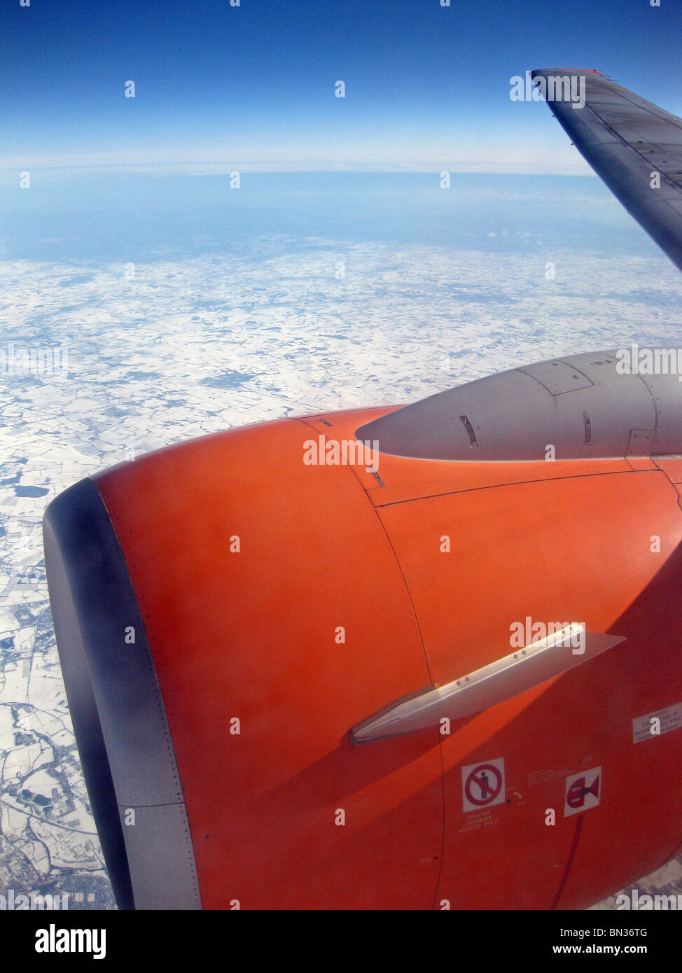 Easyjet engine cowling and wing with snowy Lincolnshire and The Wash ...