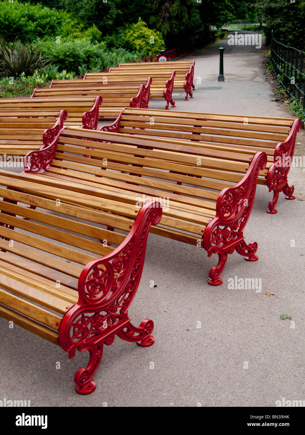 A group of new bench seats of traditional 19th Century Victorian design ...