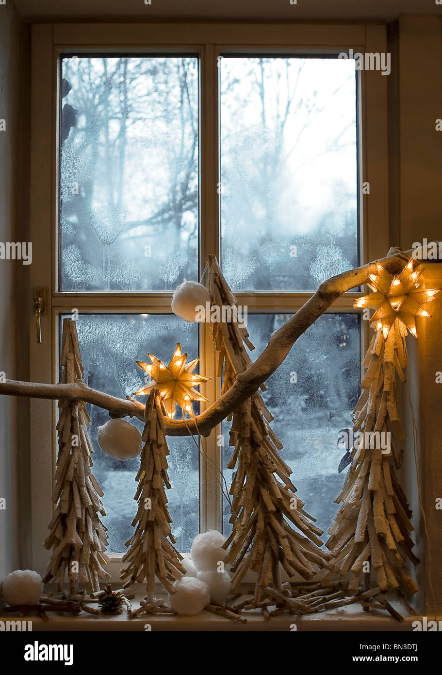 Christmas decoration at window pane Stock Photo - Alamy