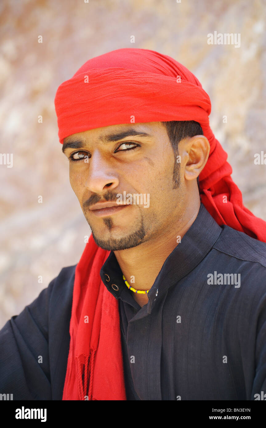 Man with red scarf on his head, portrait Stock Photo - Alamy