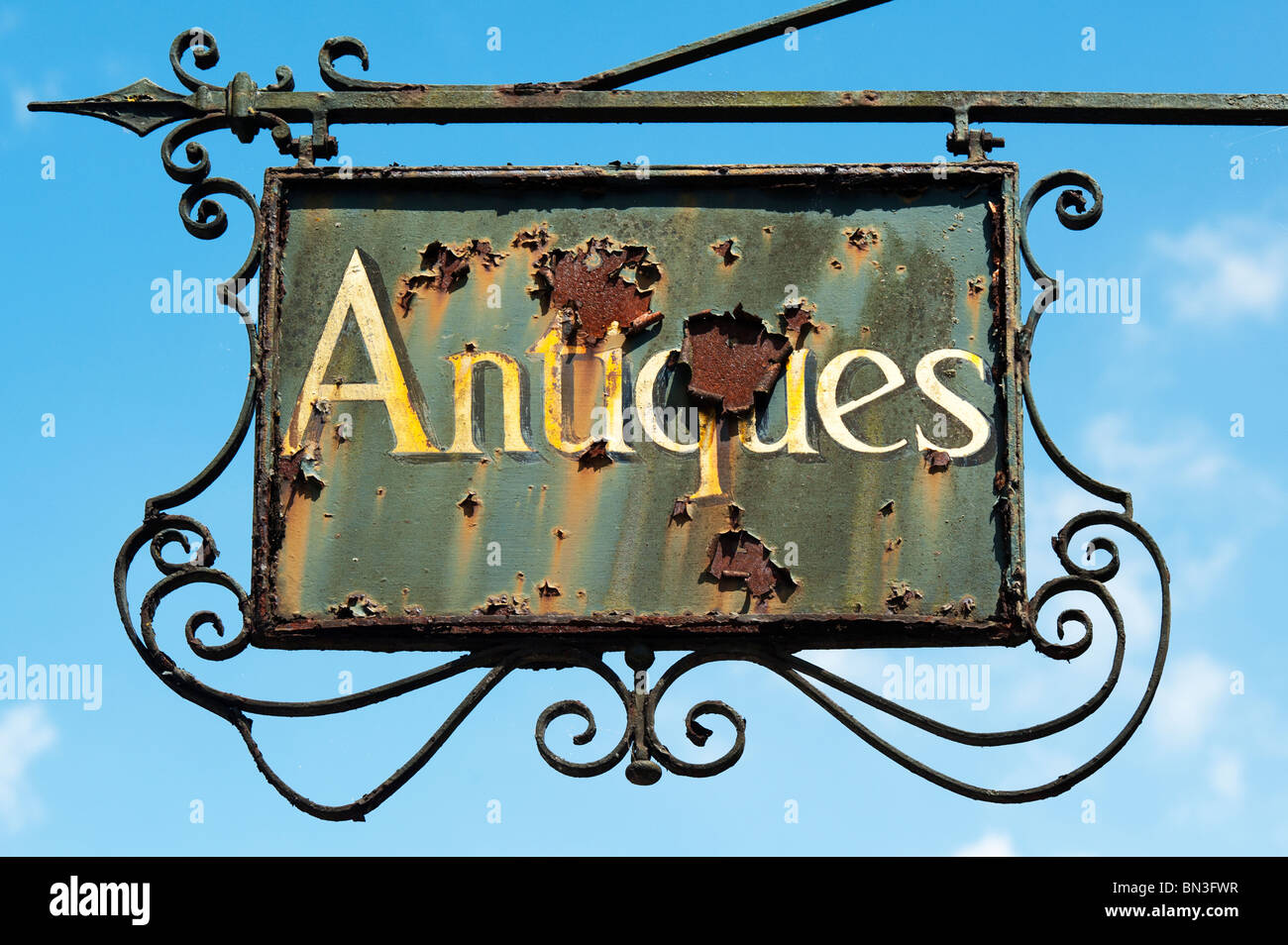 Old rusty Antiques shop sign in Stow on the Wold, England Stock Photo ...