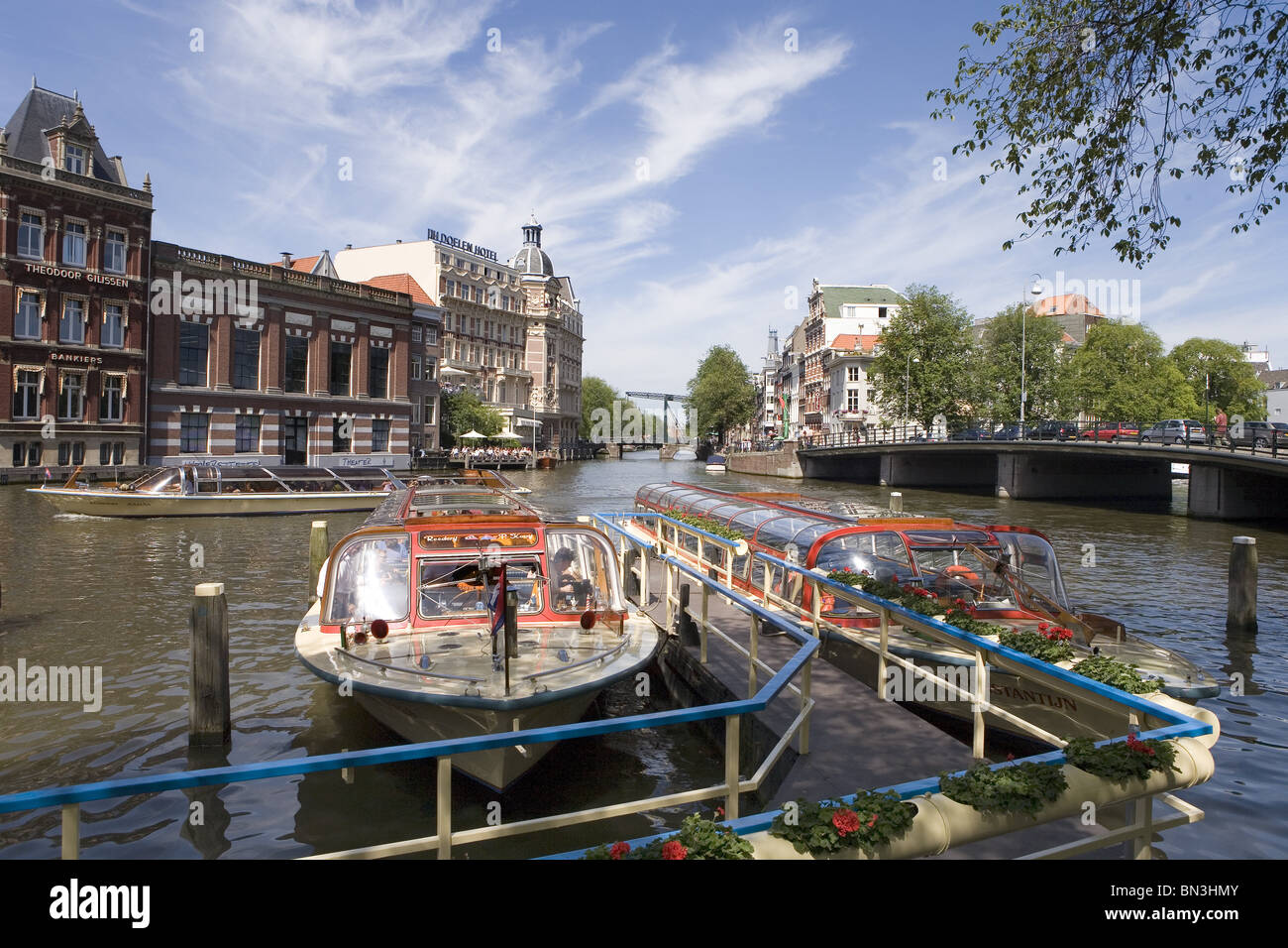Tourist boat on the Amstel River, Amsterdam, Netherlands, elevated view ...
