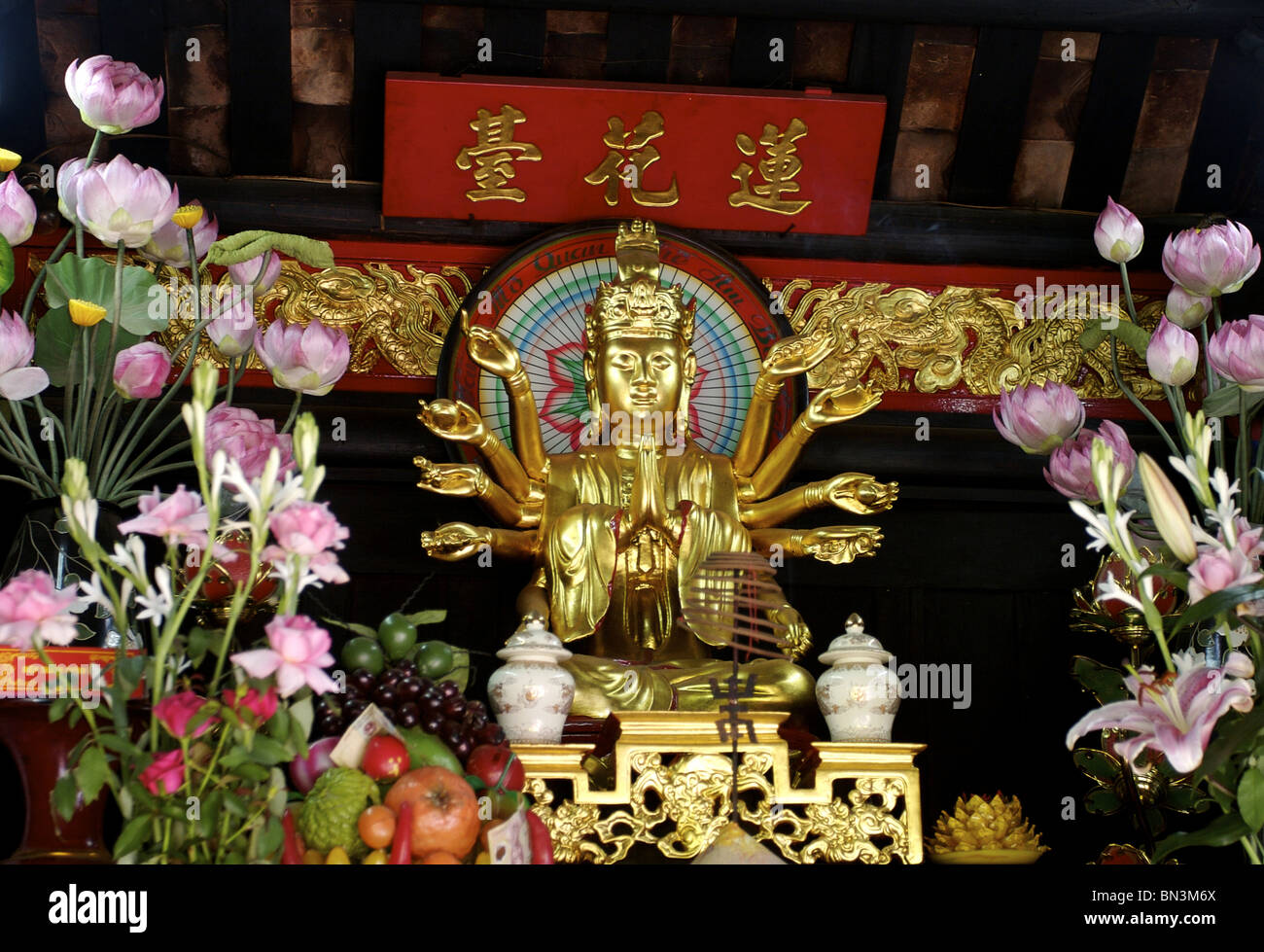 Buddhist altar at the One Pillar Pagoda (Chua Mot Cot), Hanoi, Vietnam ...