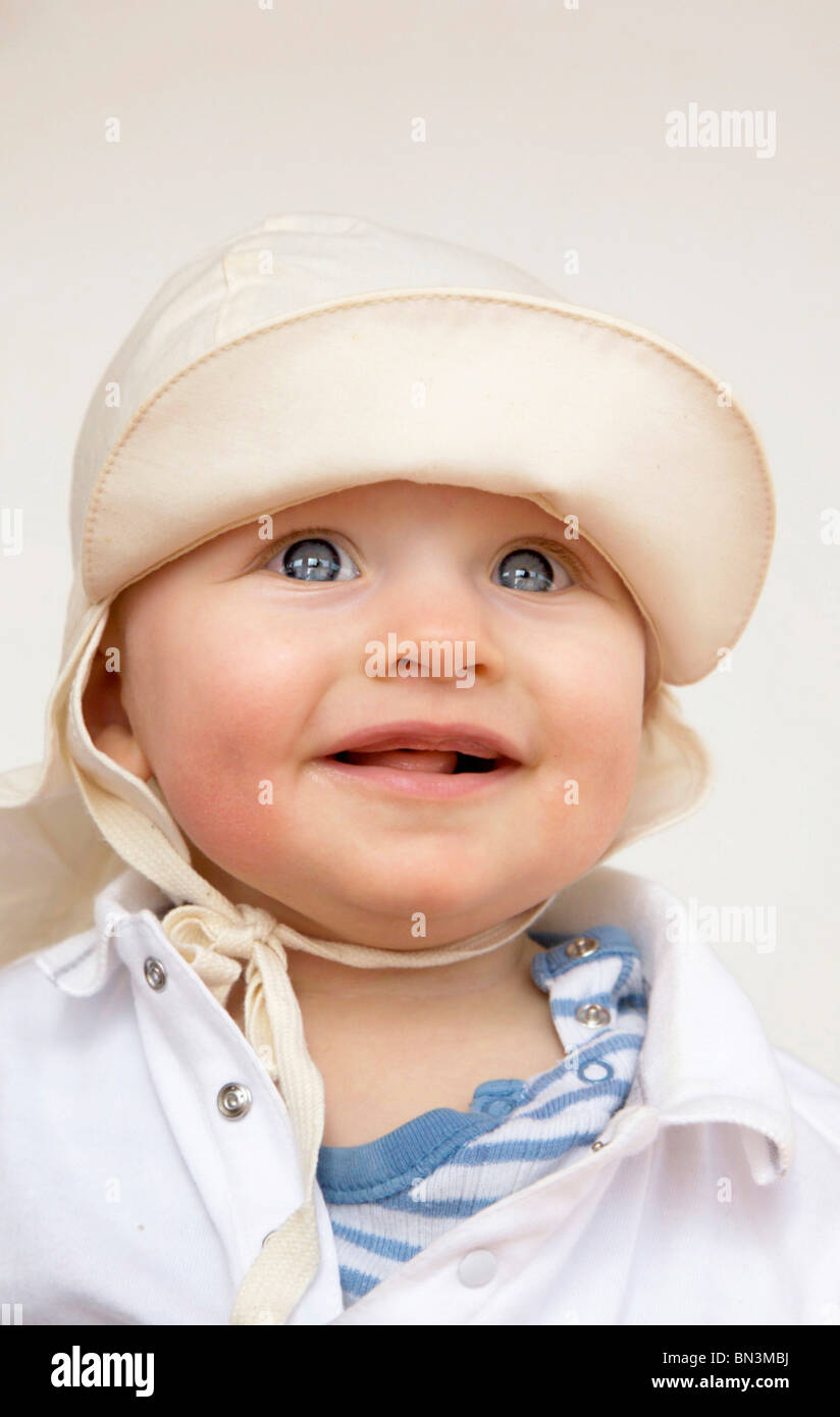 Baby wearing cap, portrait Stock Photo - Alamy