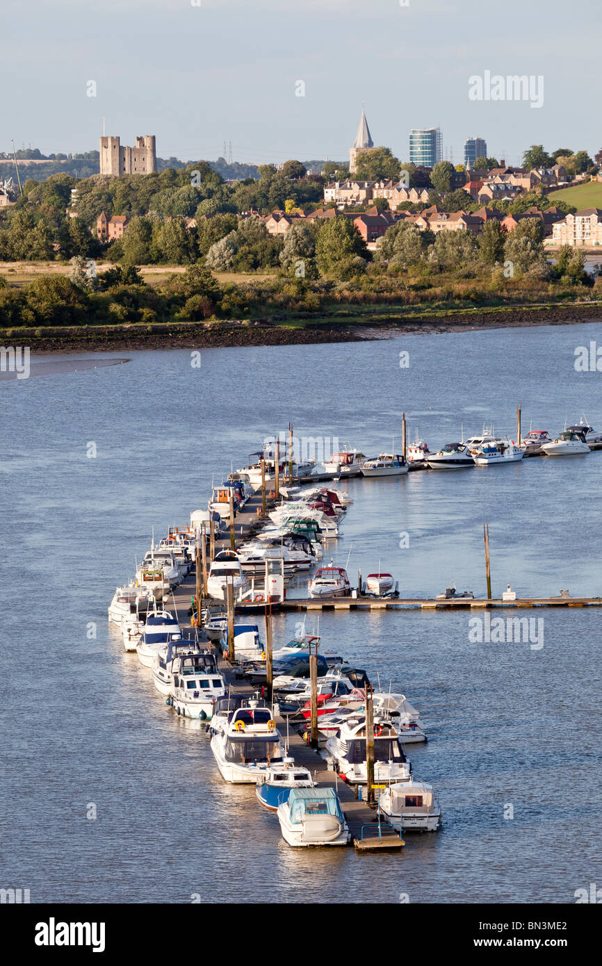 Boats moored on the River Medway with Rochester Castle and Cathedral in ...