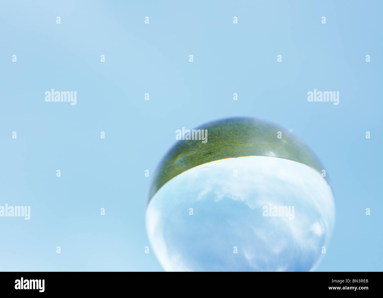 Sphere under blue sky Stock Photo - Alamy